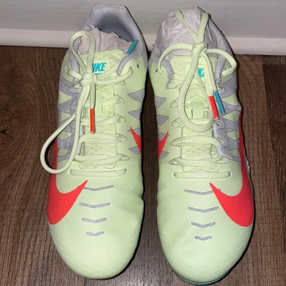 Neon Nike Track And Field Cleats Nike Takes Marketing Gold With